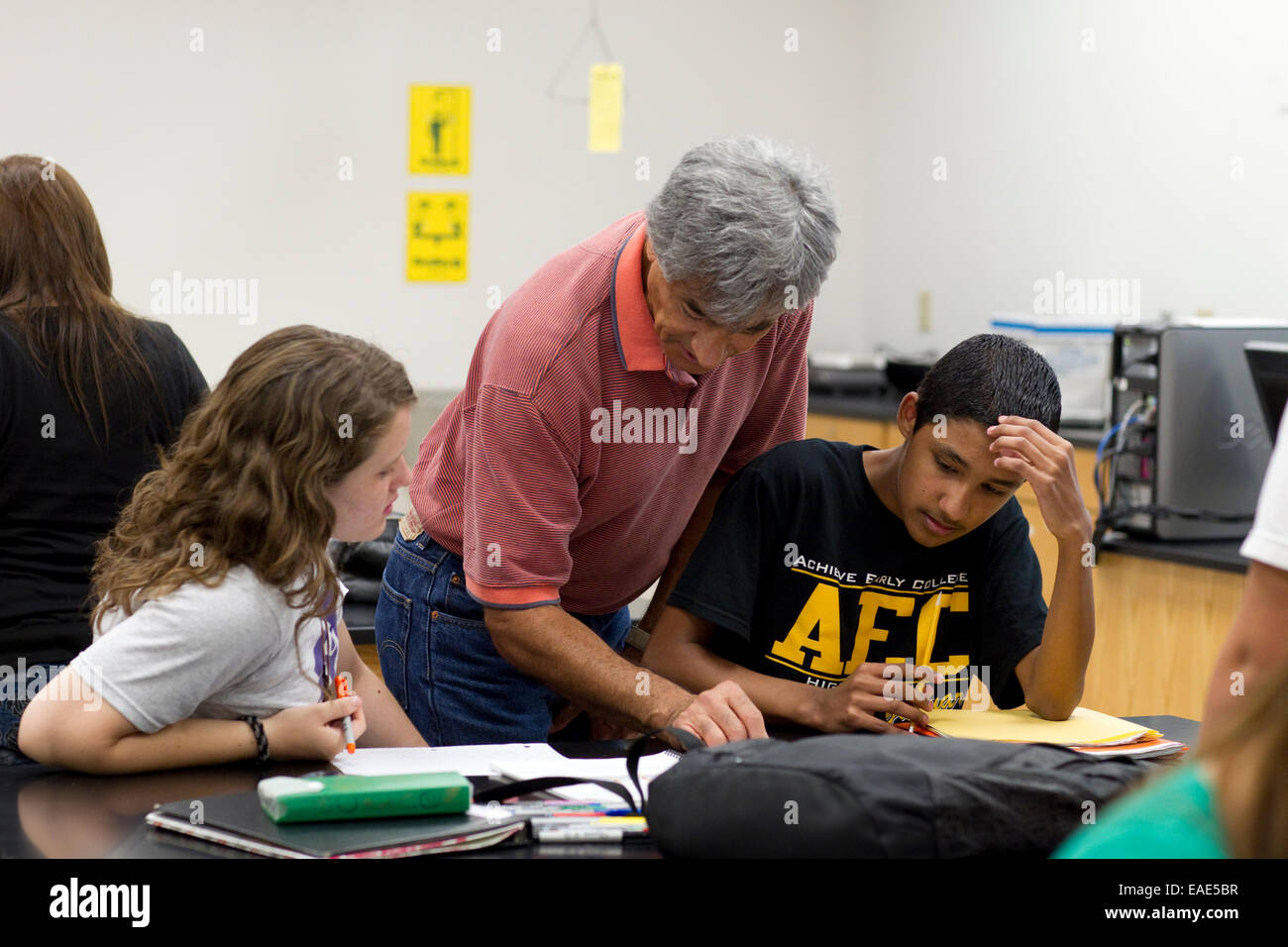 Male teacher in classroom at Achieve Early College High School in ...
