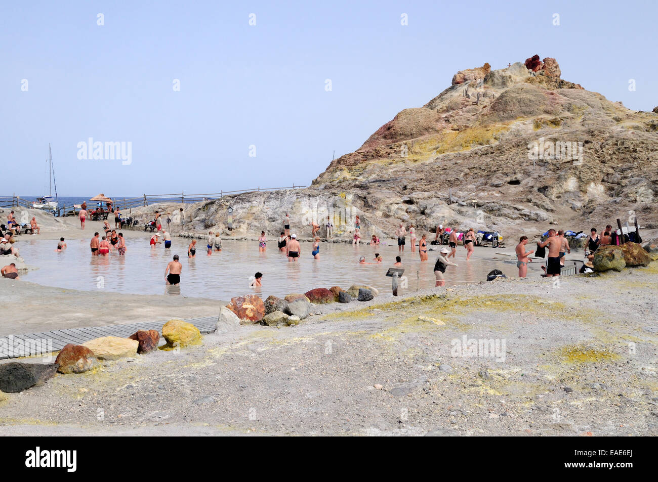 People bathing in the hot mud sulphur bath Vulcano Island Sicily Italy ...