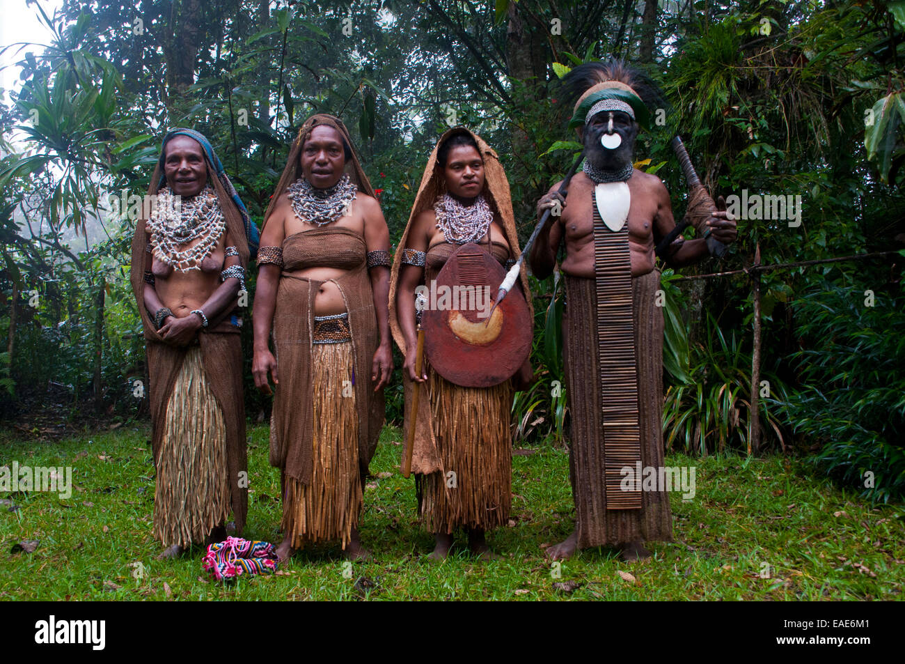 Tribal chief and three women wearing traditional dresses, Highlands ...