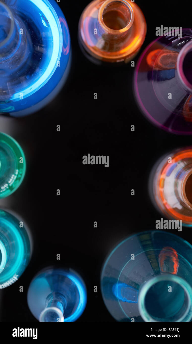 Circle of flasks with multi-color substances Stock Photo - Alamy