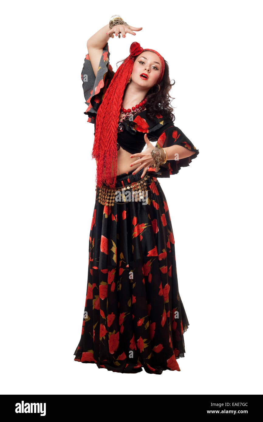 Expressive gypsy woman in a black skirt. Isolated on white Stock Photo ...