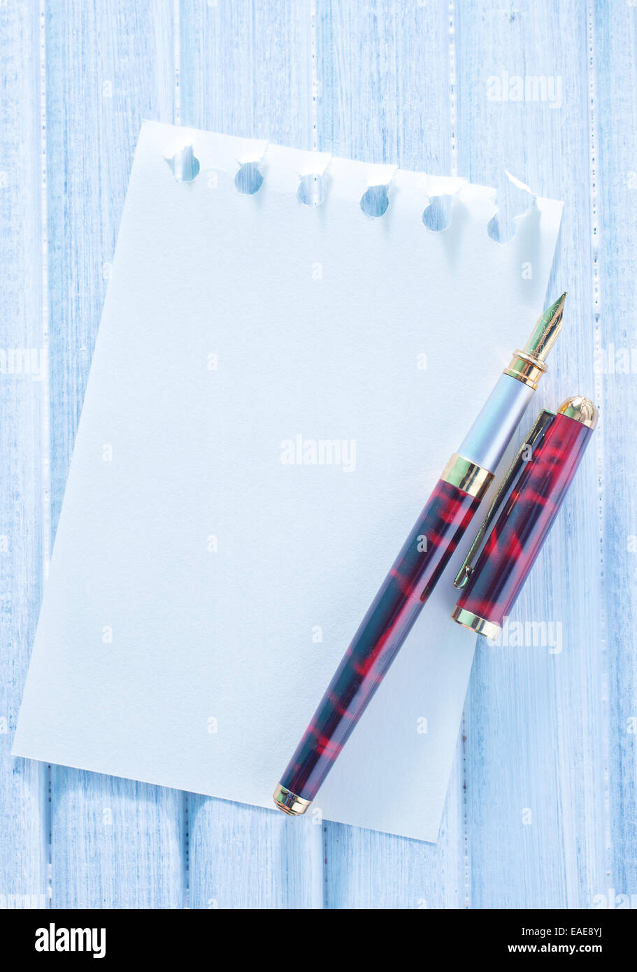 notepad on a table Stock Photo - Alamy