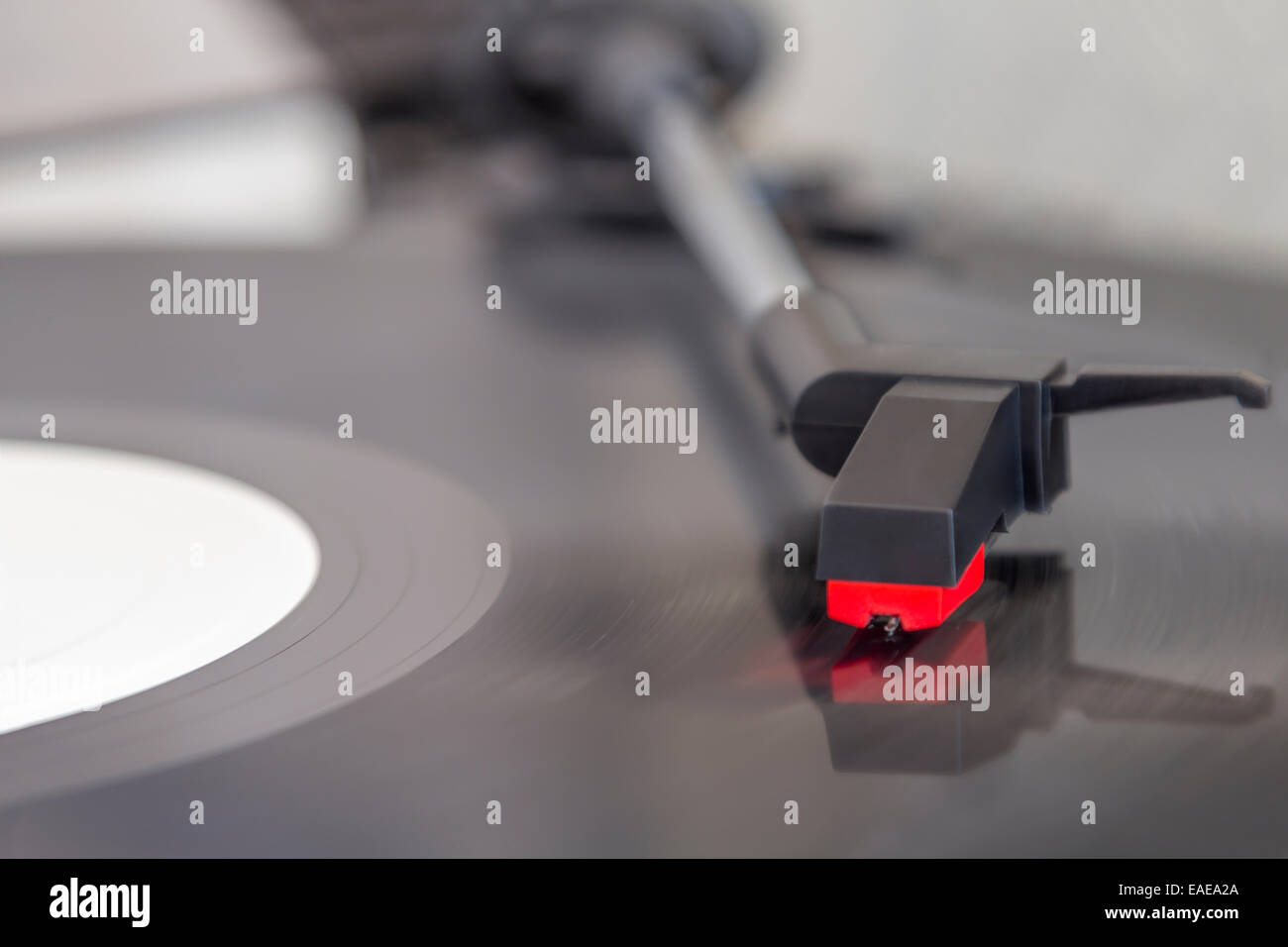 Detail view of record player with spinning disc Stock Photo - Alamy
