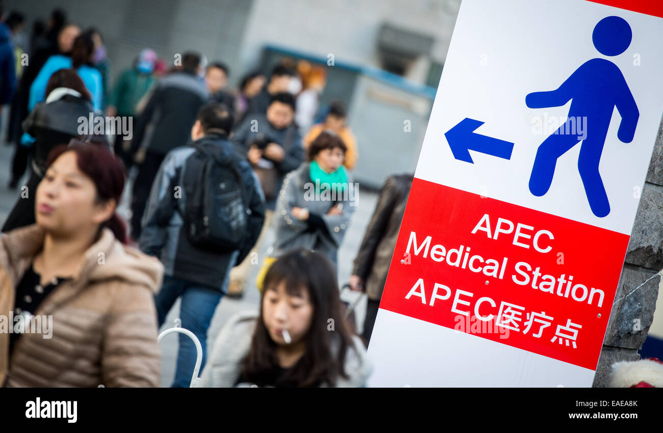 A sign reads 'APEC Medical Station' in front of a hospital in Beijing ...