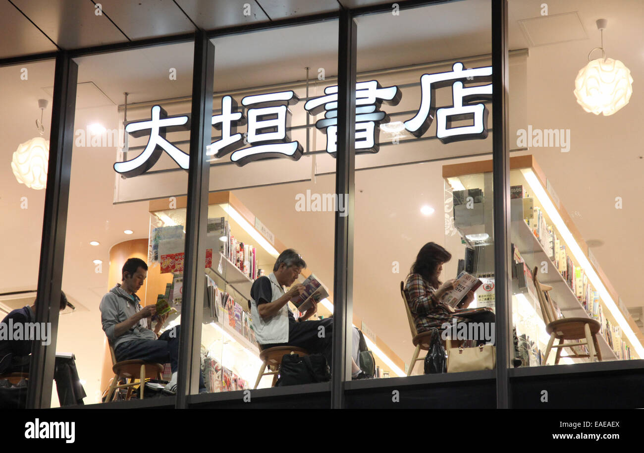 Visitors of a library are reading books and magazines in Kyoto, October ...