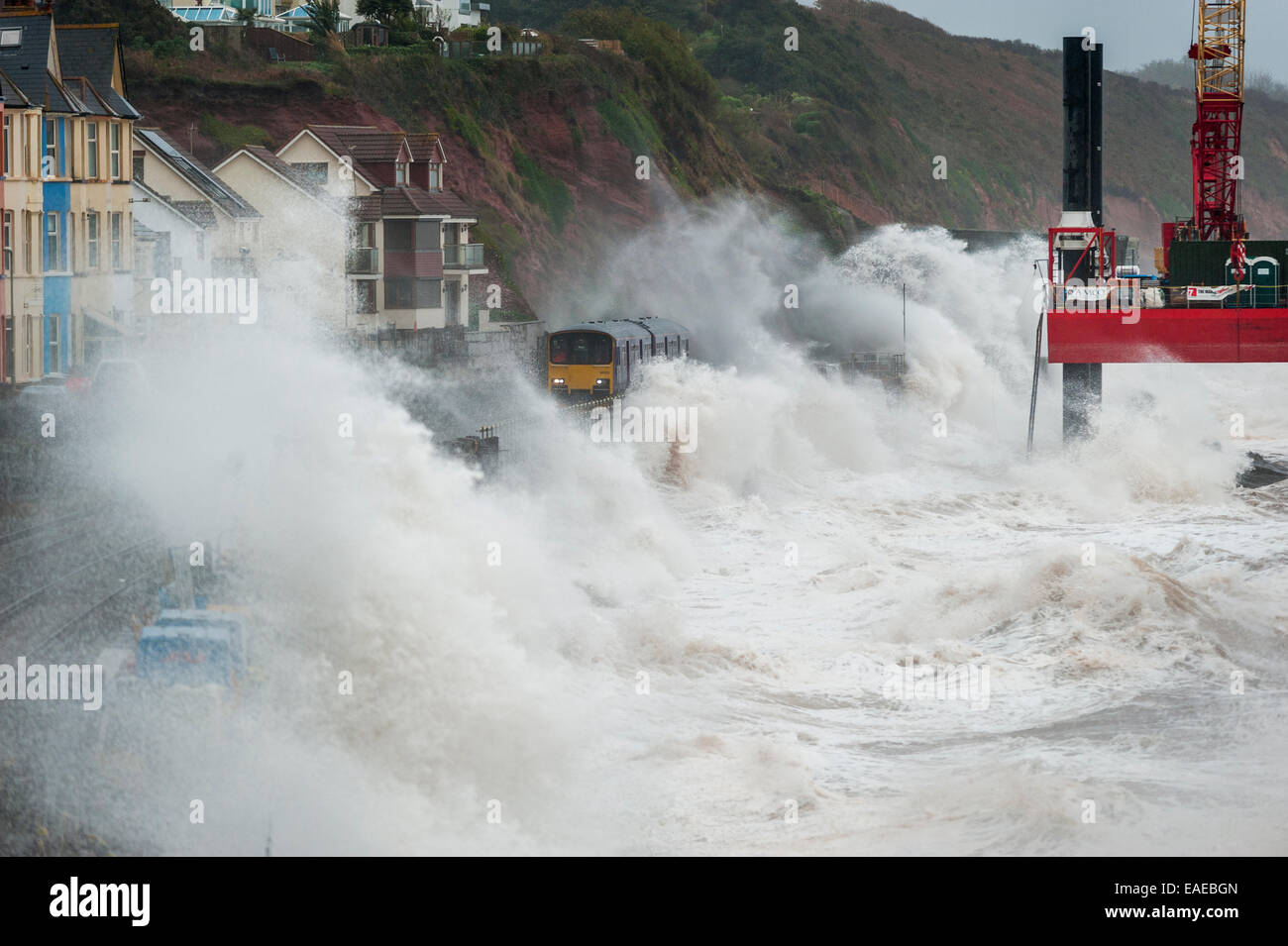 Stormy weather brings waves crashing over trains at Dawlish, Devon, UK ...