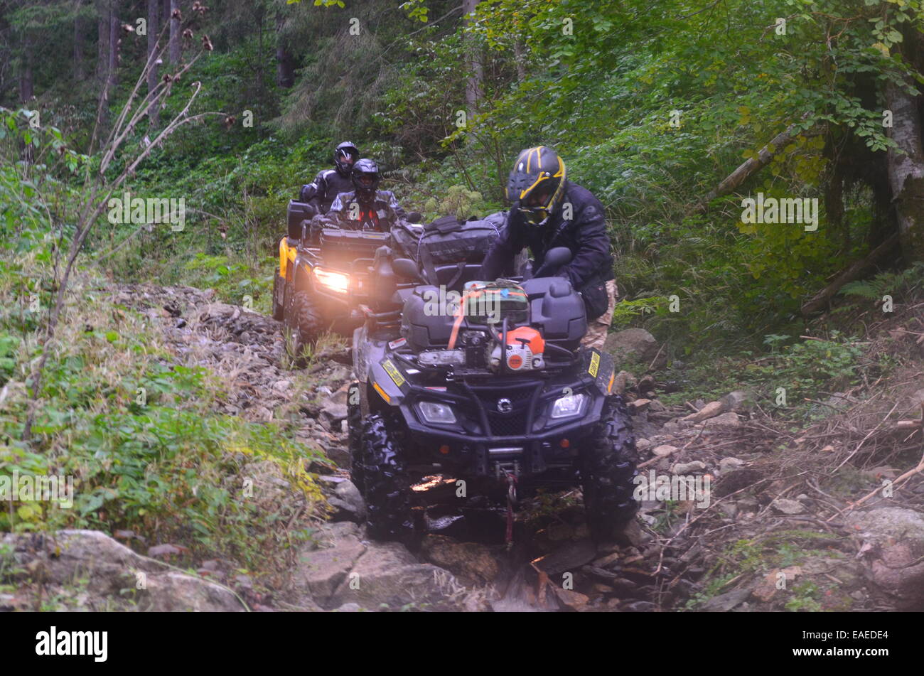 Driving ATVs in beautiful landscapes Stock Photo - Alamy