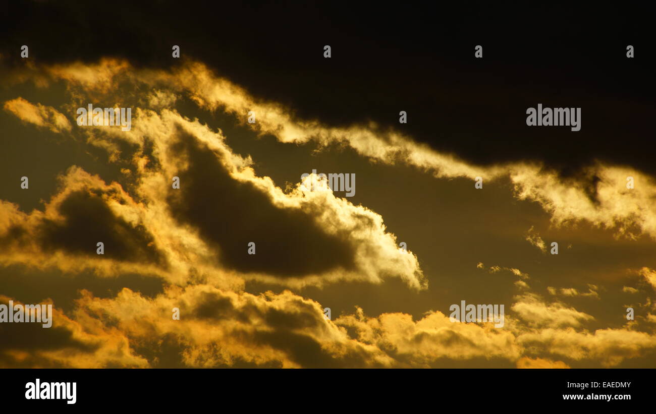 Abstract golden clouds hi-res stock photography and images - Alamy
