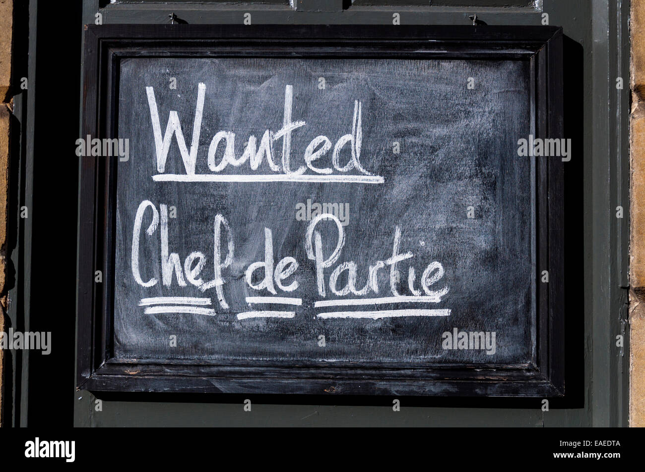 Signage sign outside restaurant Wanted Chef de Partie Stock Photo - Alamy