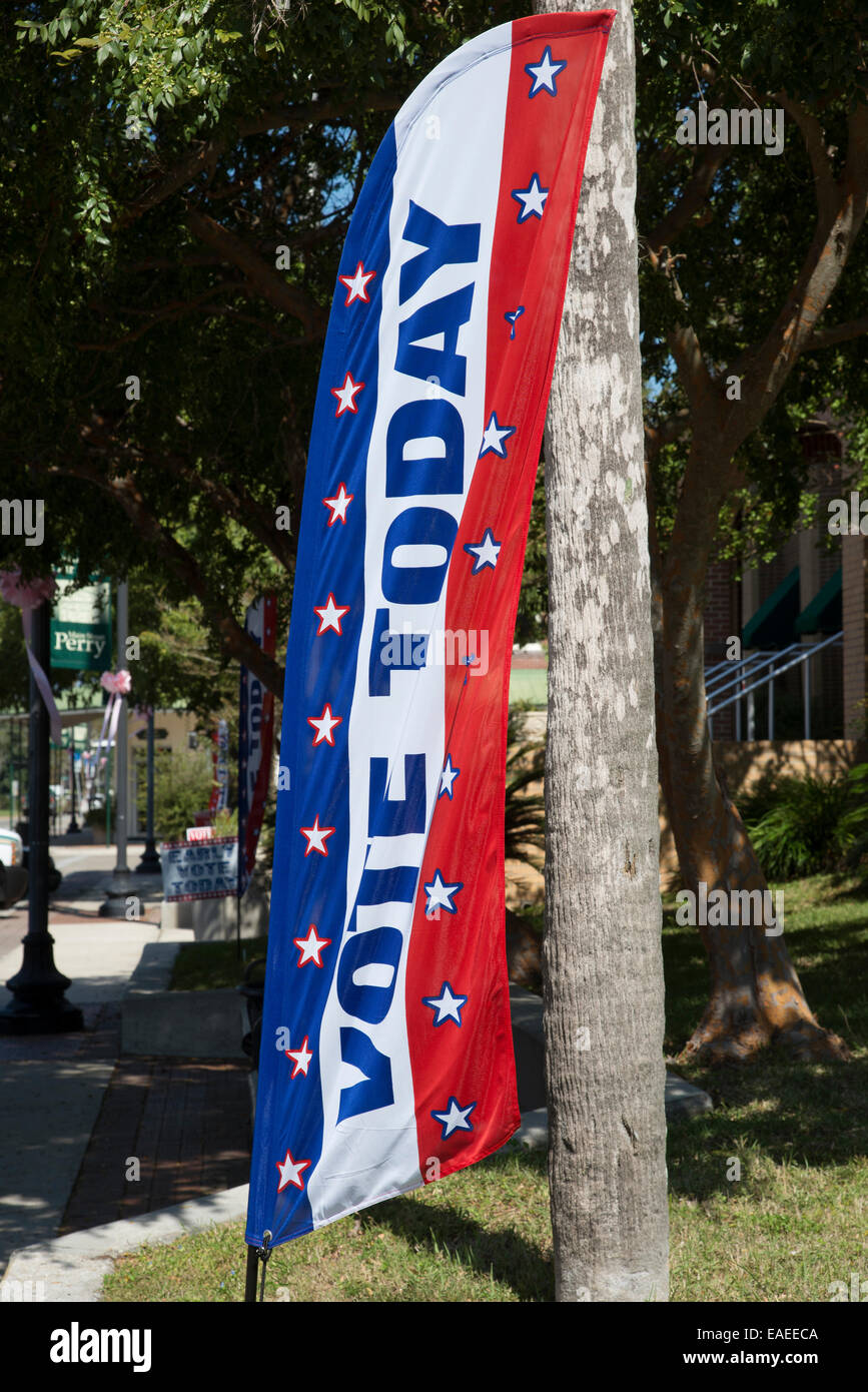 Red and white vote here sign hi-res stock photography and images - Alamy