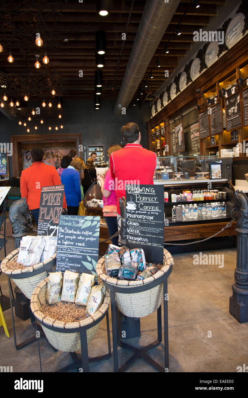 Customers wait in line Starbucks coffee shop in New Orleans USA Stock ...