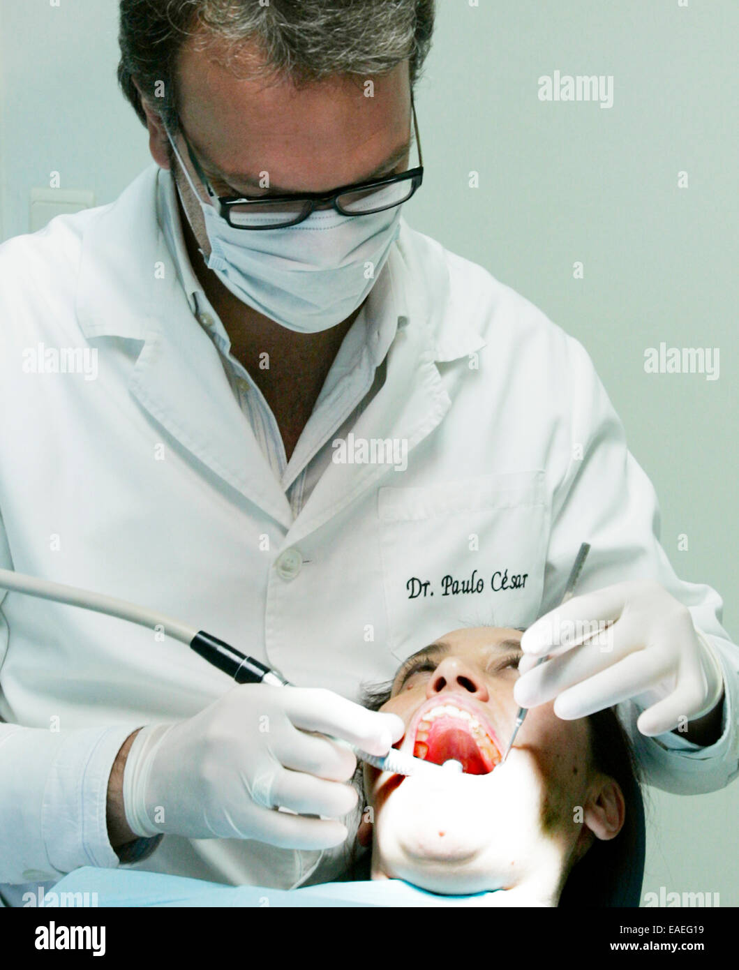 The Dr. Paulo Cesar from Brazil working on patient in his clinic in ...