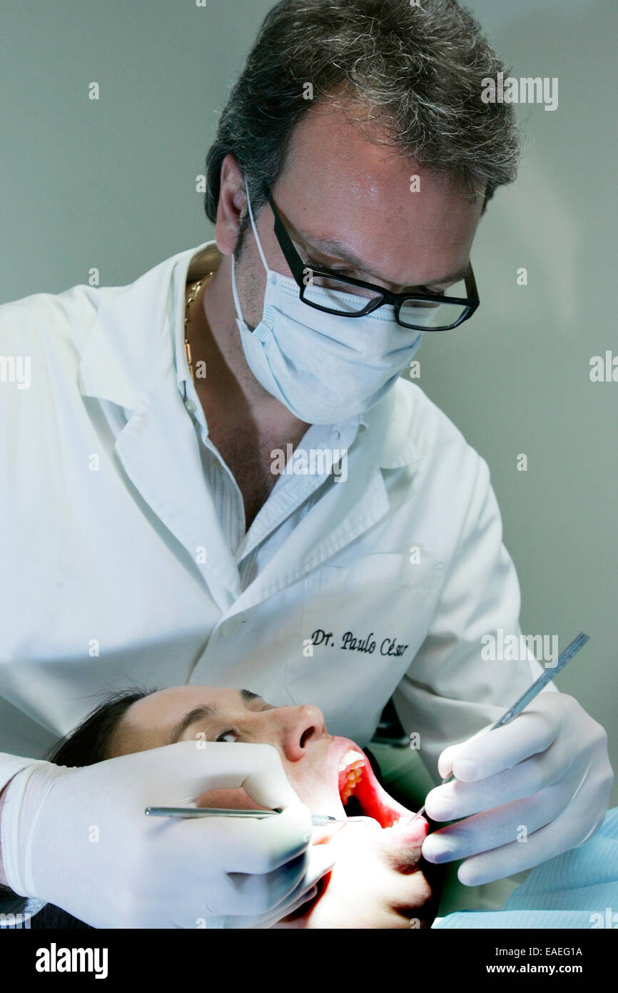 The Dr. Paulo Cesar from Brazil working on patient in his clinic in ...