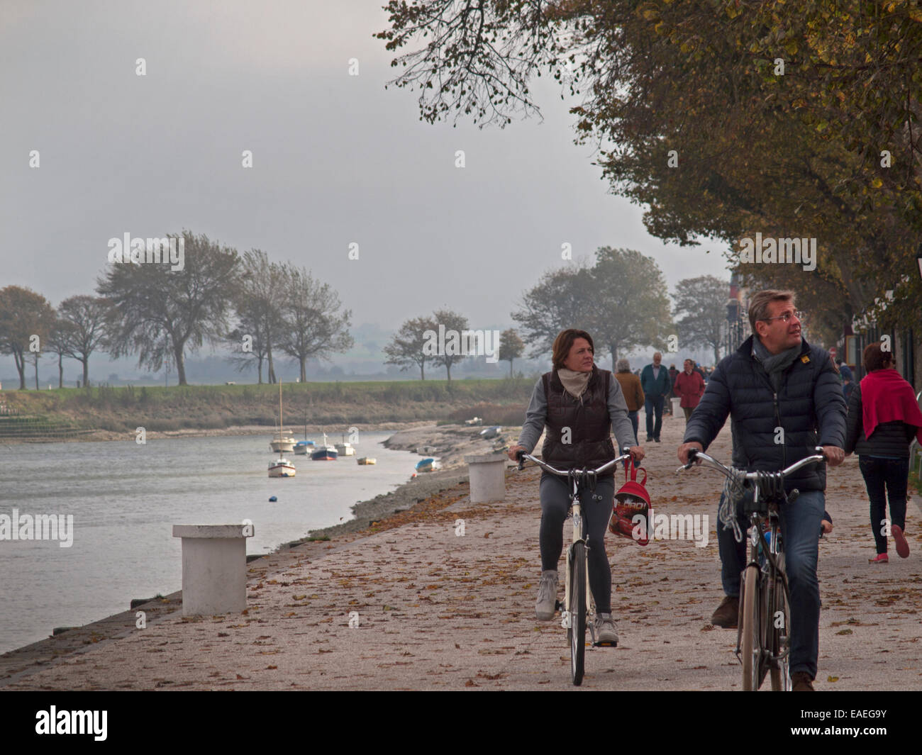Promenading along the waterside boardwalk in Saint-Valery-sur-Somme ...