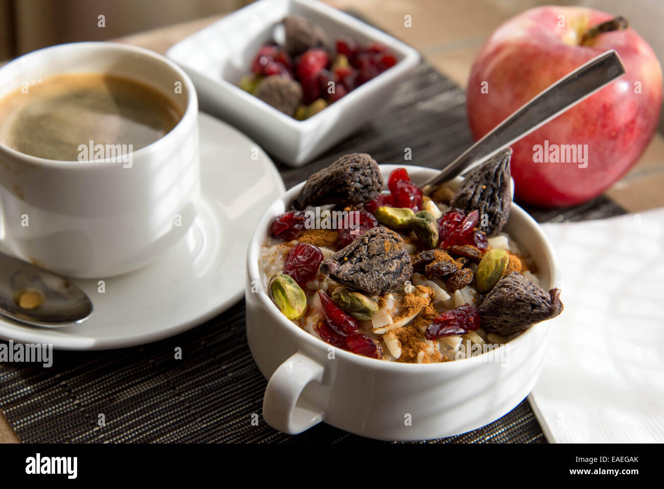 Fresh fruit and oatmeal with nuts and fruit toppings for breakfast ...