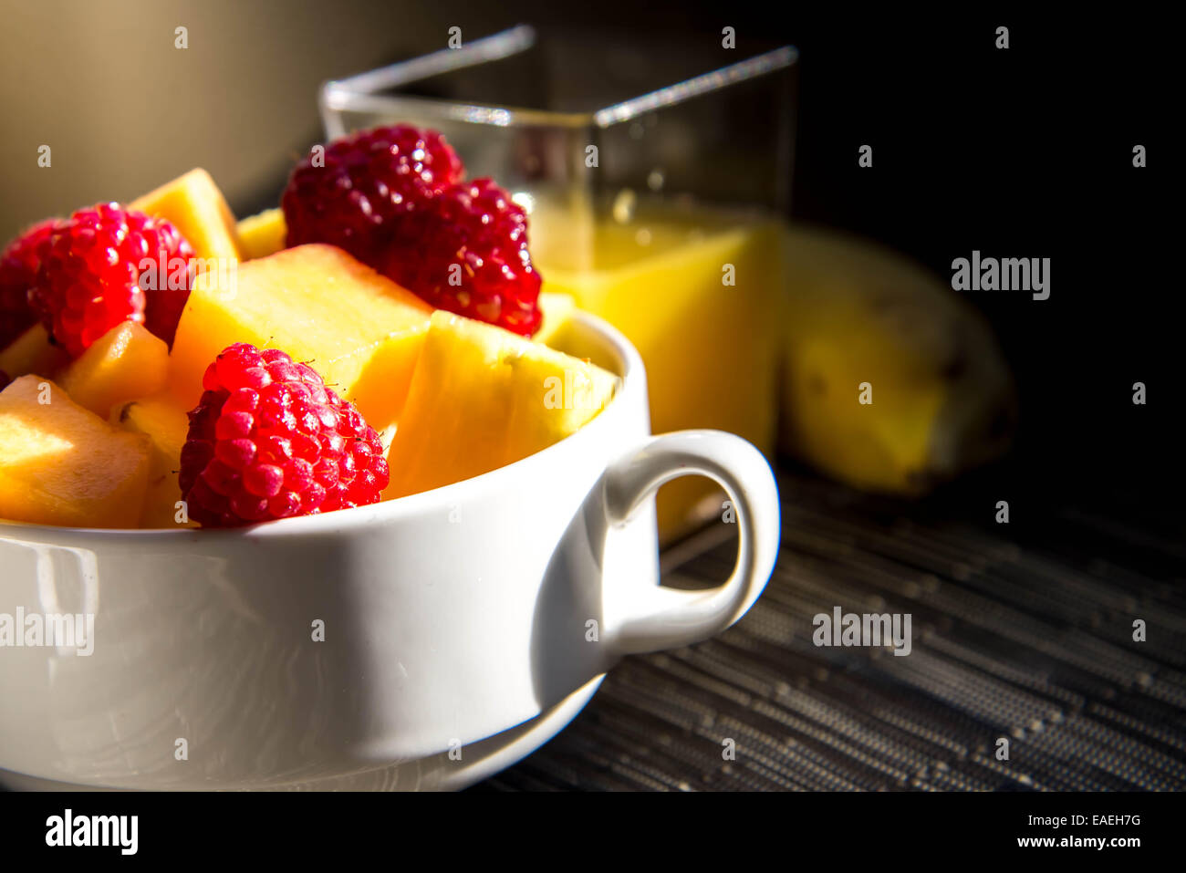 nutritious fresh fruit and orange juice breakfast Stock Photo - Alamy