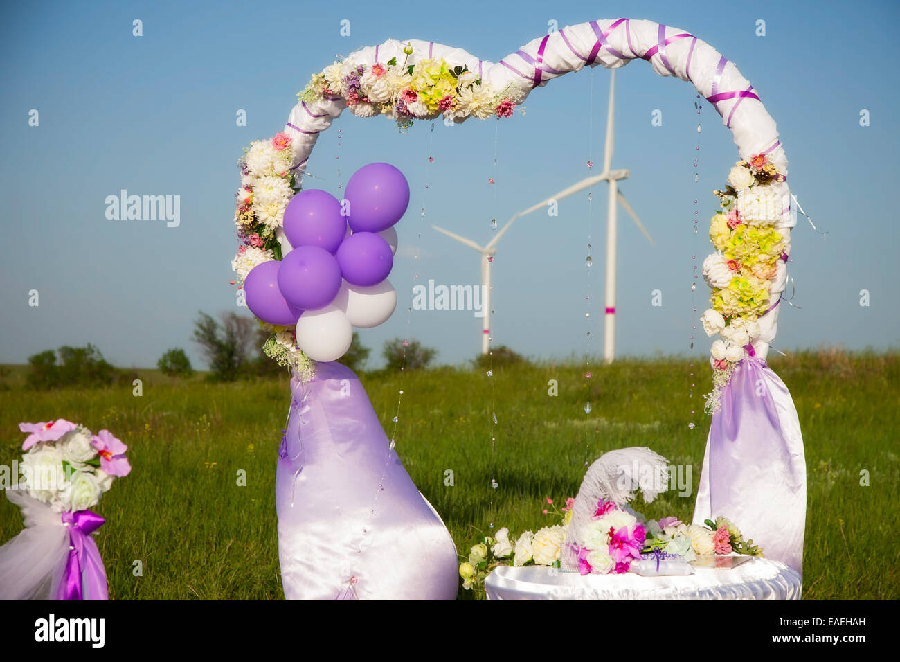 wedding ceremony in a field with windmills Stock Photo - Alamy