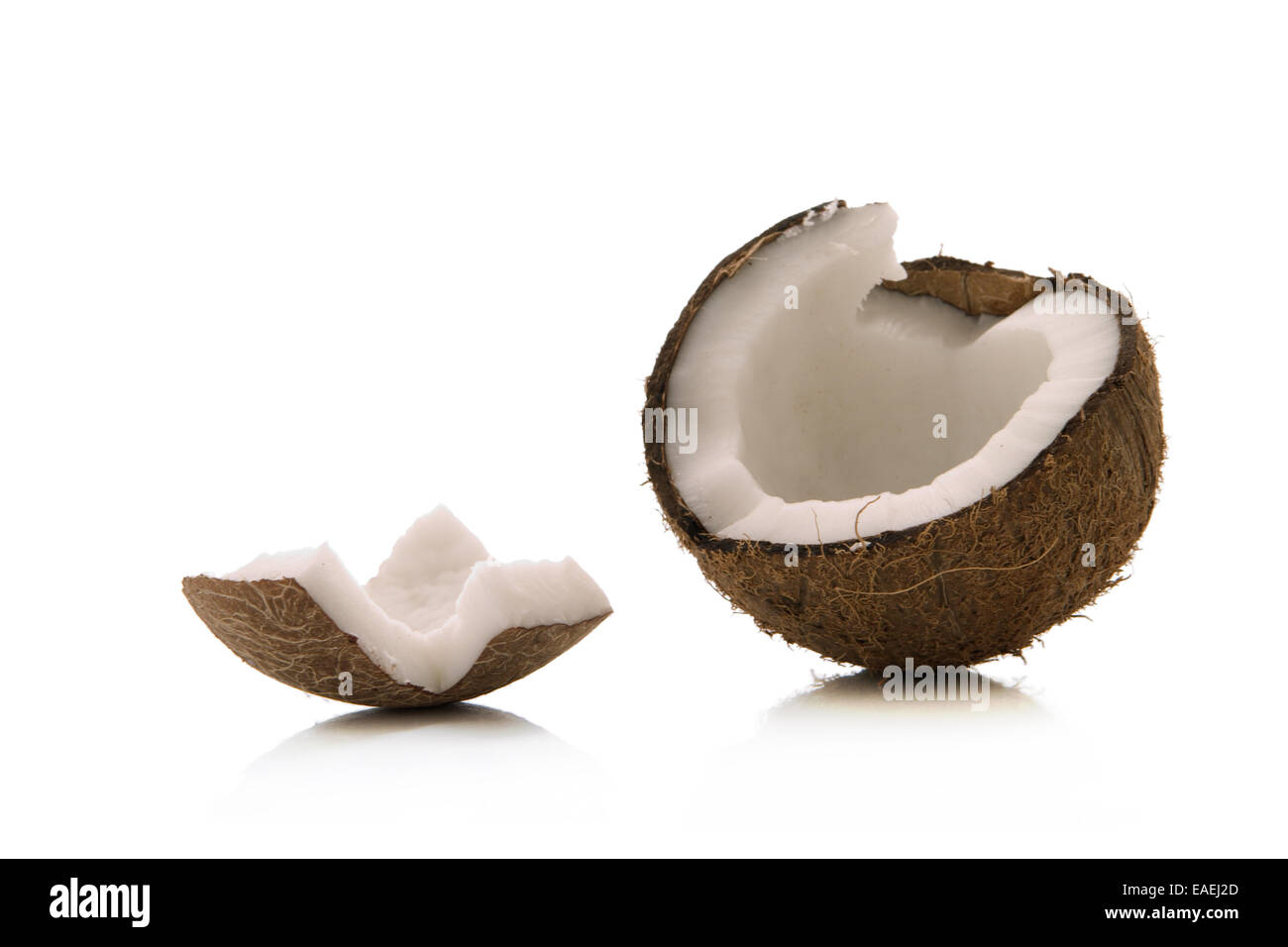 open coconut over white background Stock Photo - Alamy