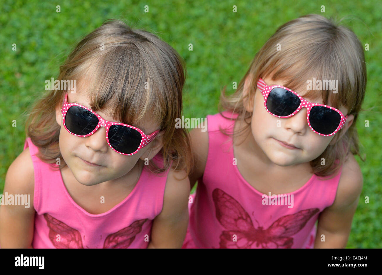 Twins, girls Photo: Frank May Stock Photo - Alamy