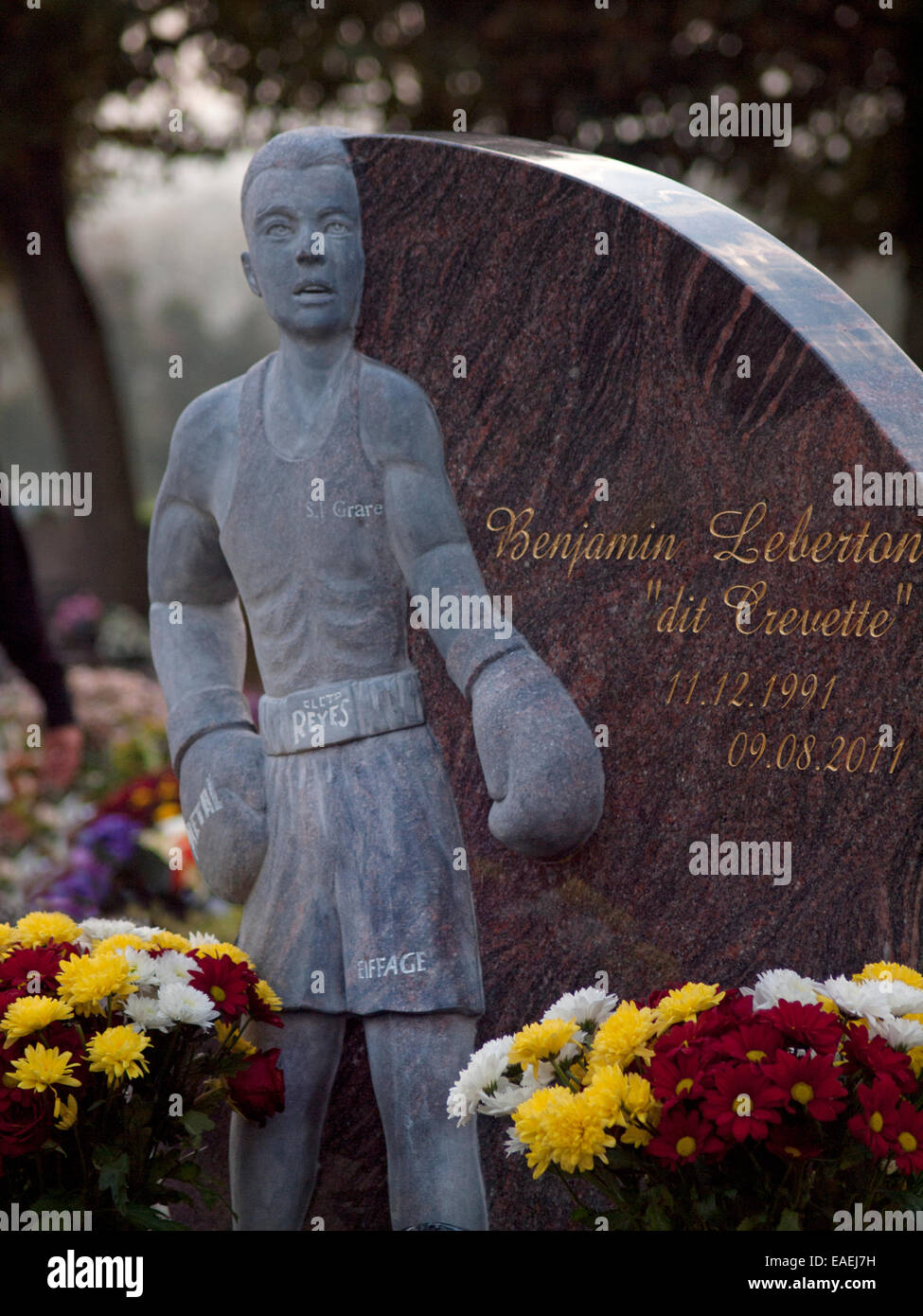 The carved gravestone of a young boxer in a cemetery in Abbeville ...