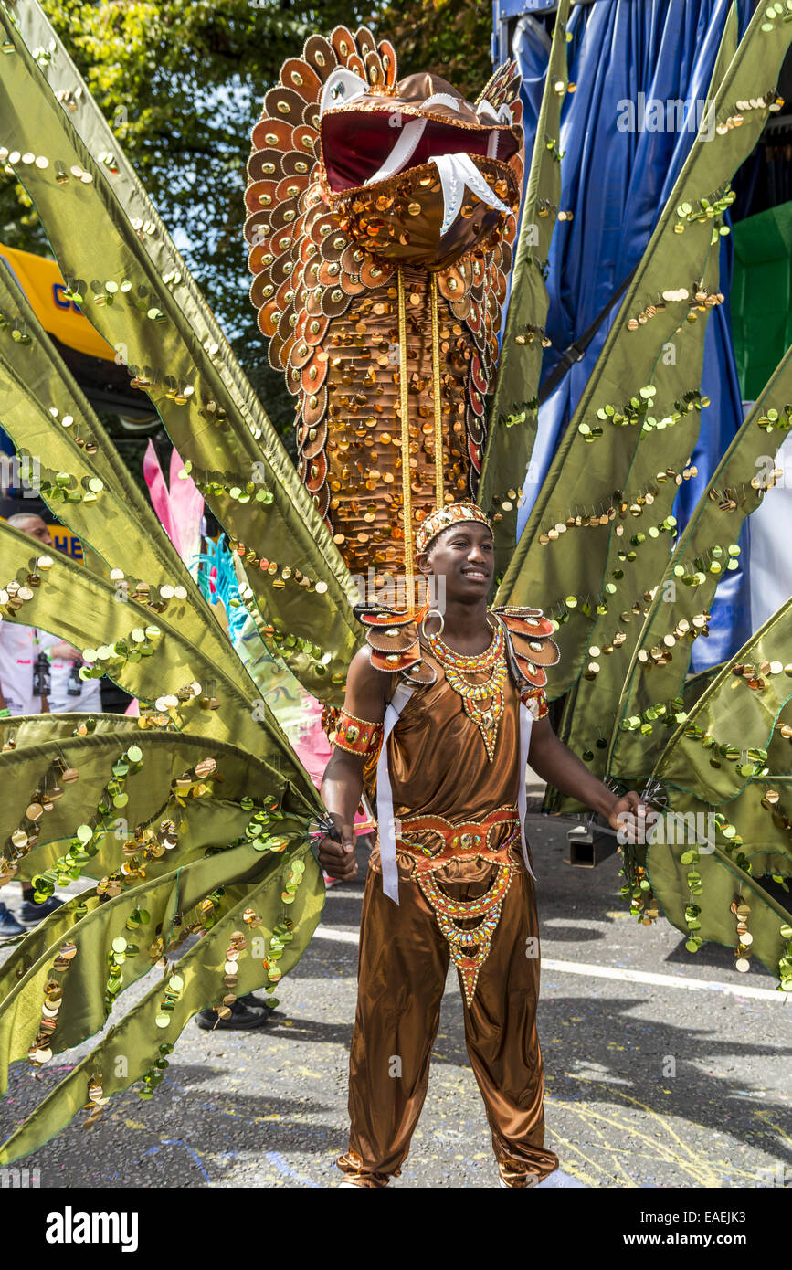 Dancers at the Notting Hill Carnival in London wear exotic and ...