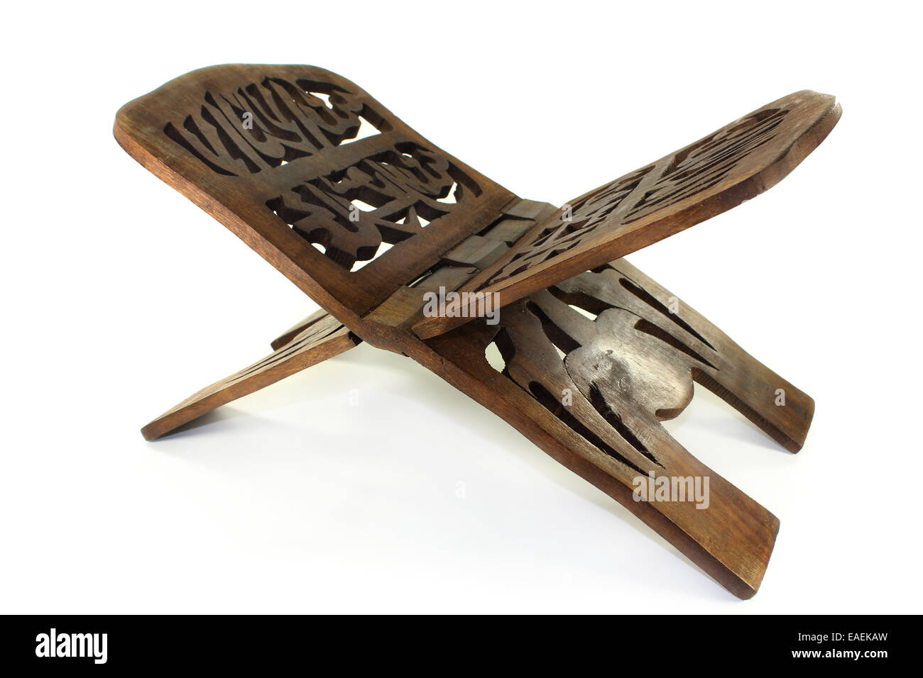 a Koran wooden stand in front of white background Stock Photo - Alamy