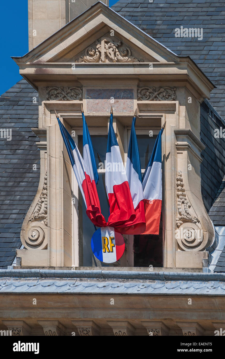 French flags flying for Bastille Day in the window of Reims City Hall ...