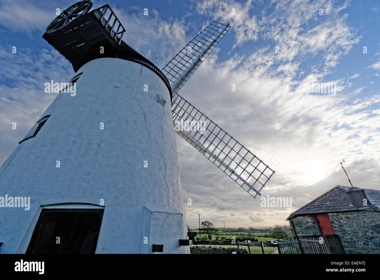 Sails of a windmill looking towards the sky and its power supply that ...