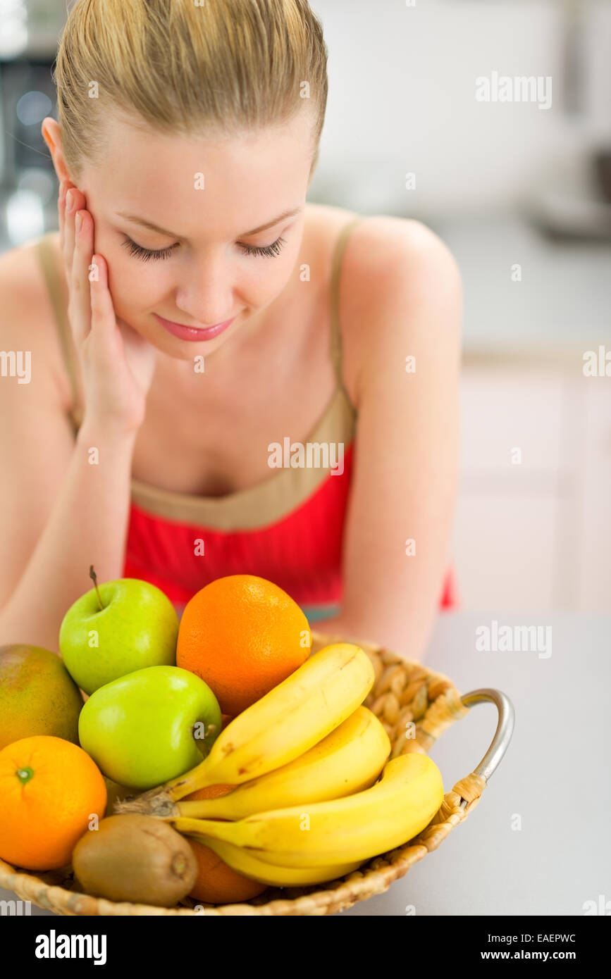 Portrait of young woman with fruits Stock Photo - Alamy