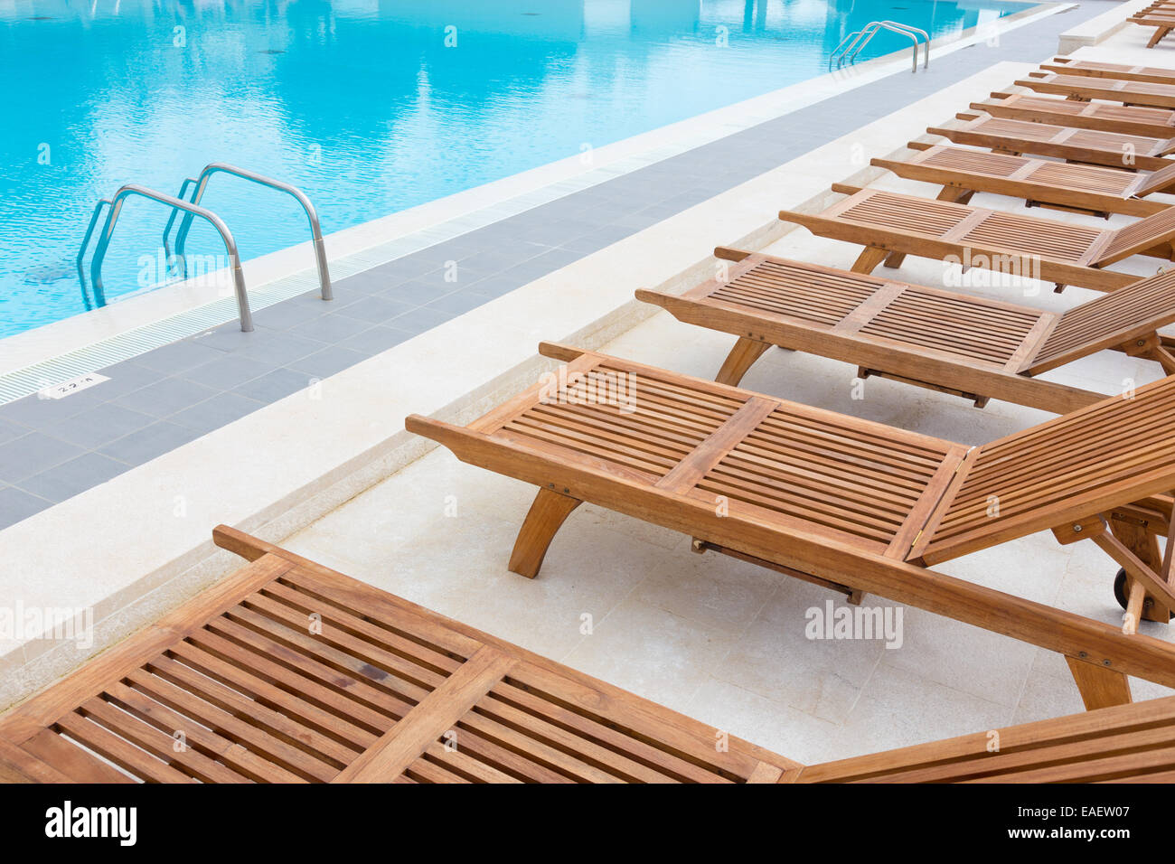 Outdoor pool with sunbeds hi-res stock photography and images - Alamy
