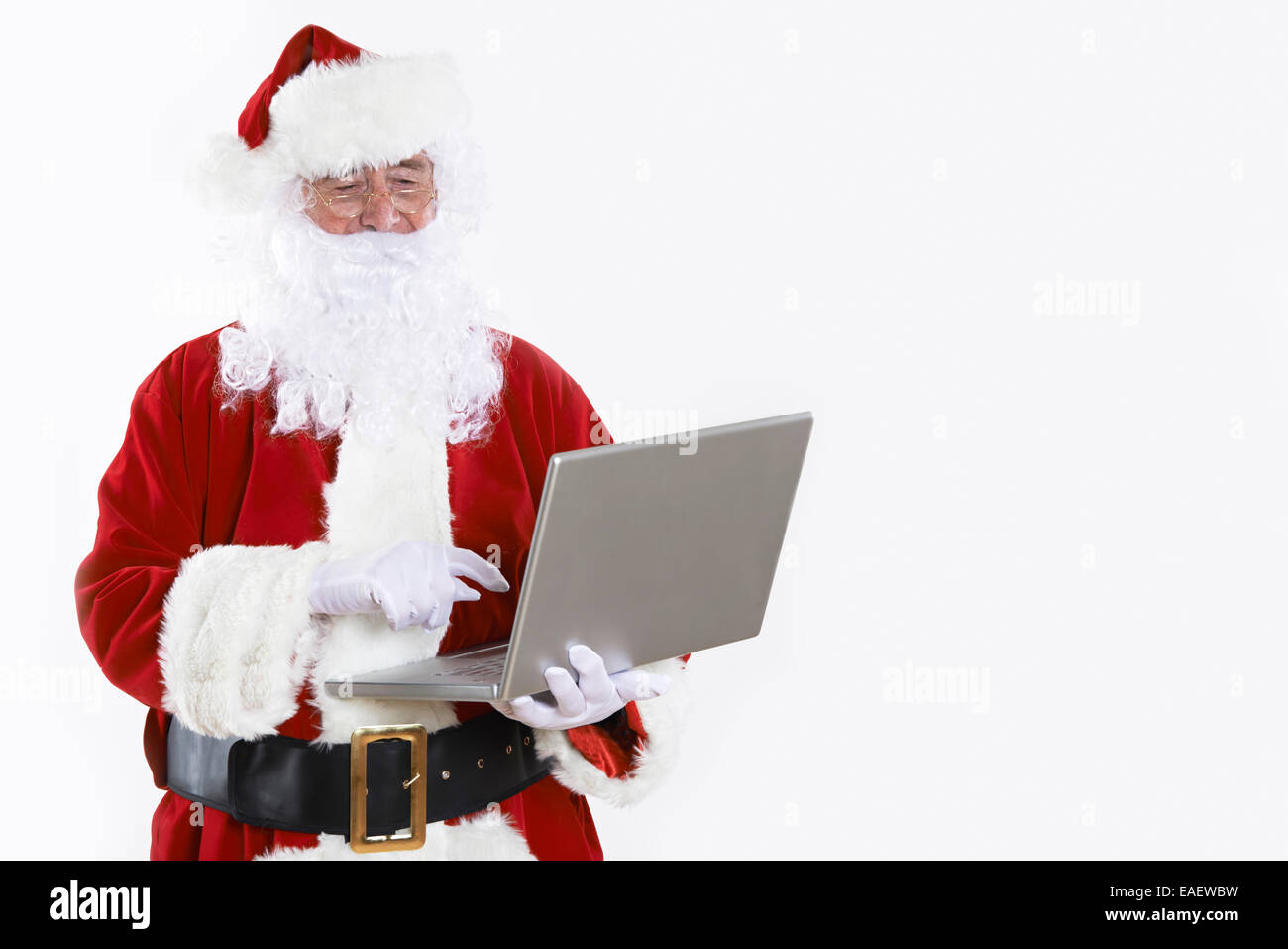 Santa claus using laptop computer hi-res stock photography and images ...