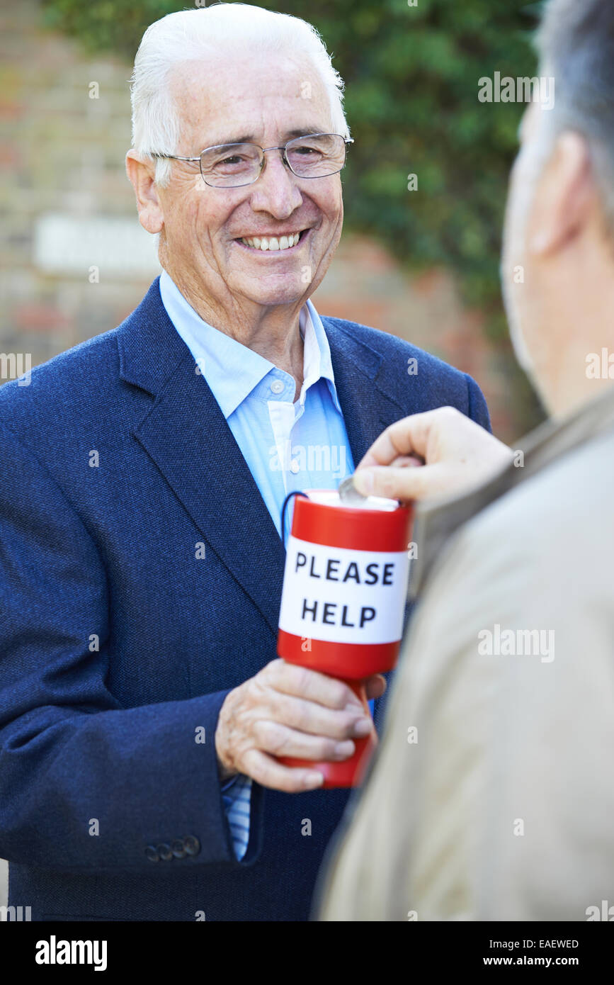 Collecting money hi-res stock photography and images - Alamy