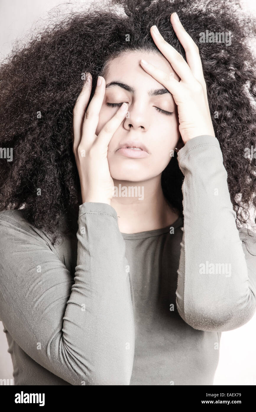 Portrait of a sad, latin woman Stock Photo - Alamy
