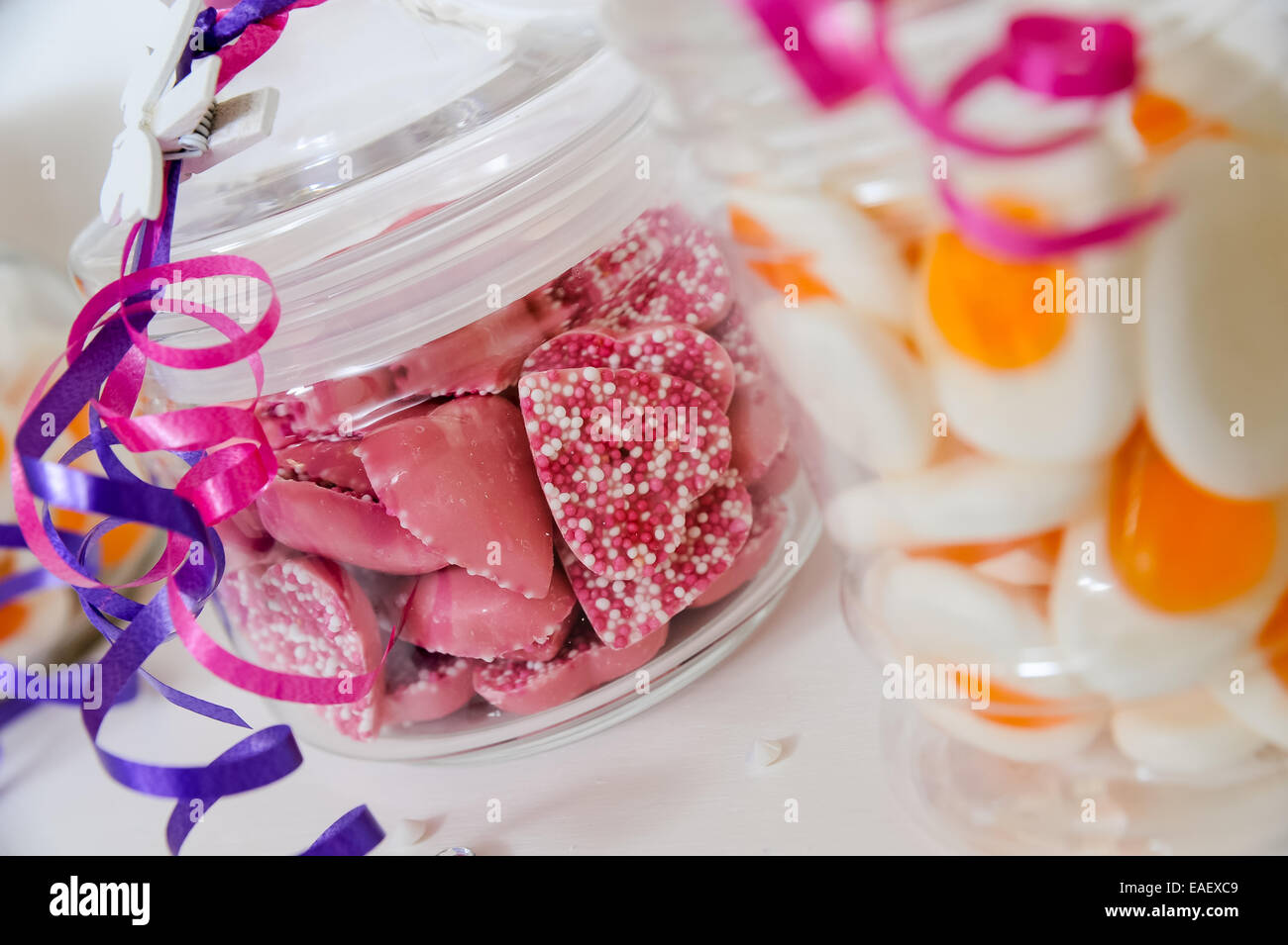 A jar of sweets on display on a sweet cart Stock Photo - Alamy