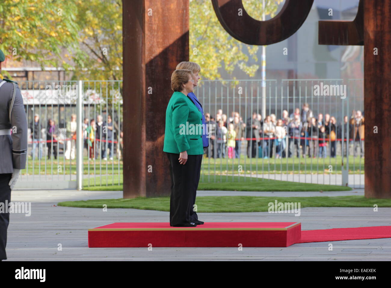 Angela Merkel and Michelle Bachelet receive military honors during ...
