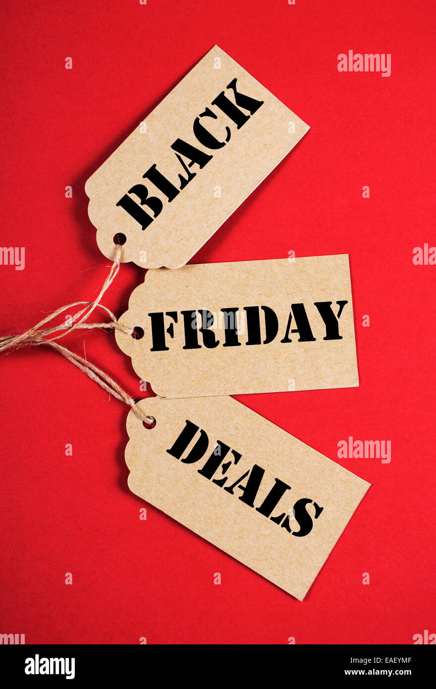 Black Friday Sale message sign on brown paper sale tags on red ...