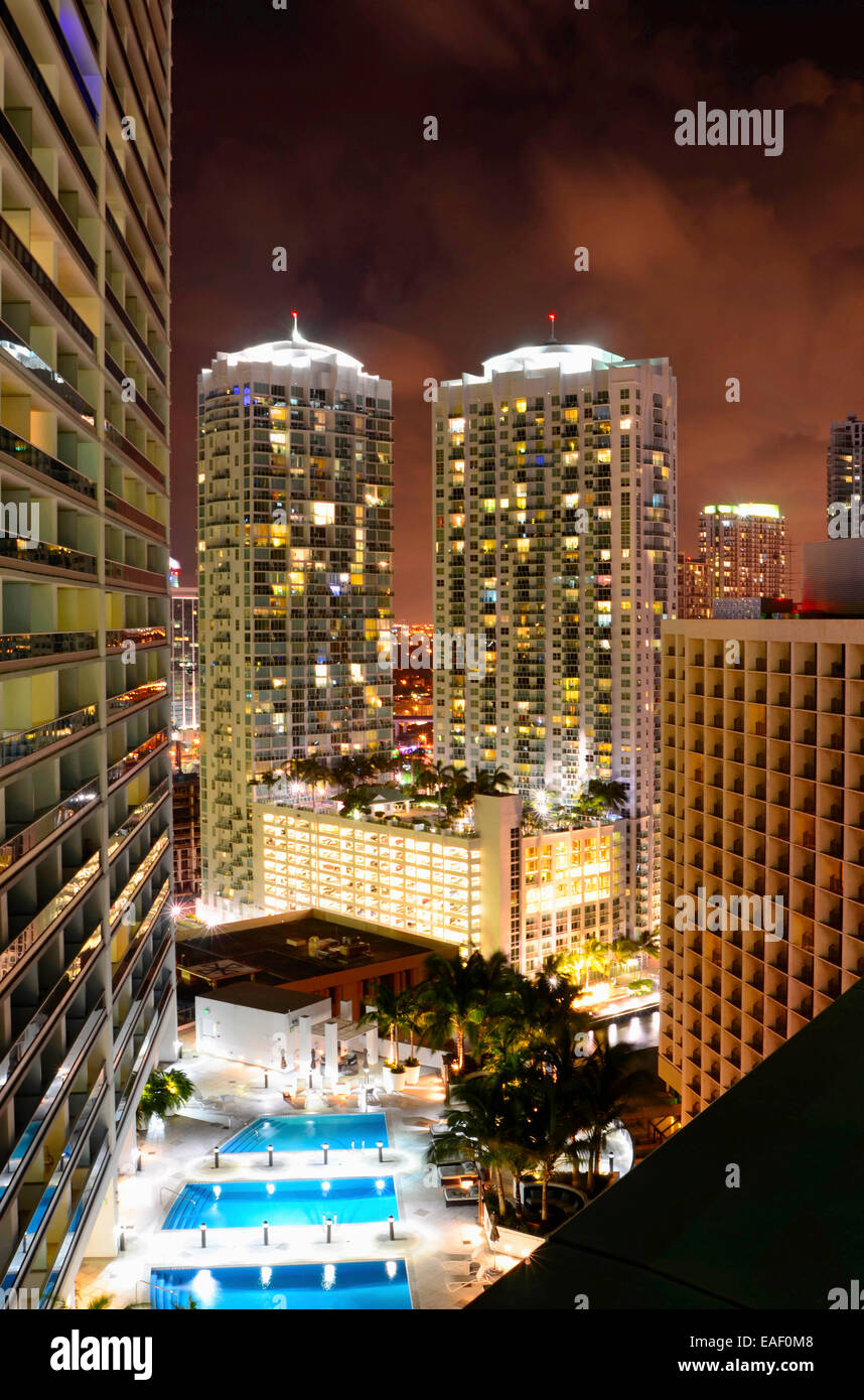 View of the Miami skyline at night with city lights and light trails ...