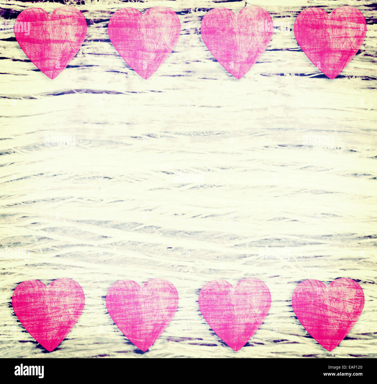 Retro filtered background with wooden hearts Stock Photo - Alamy