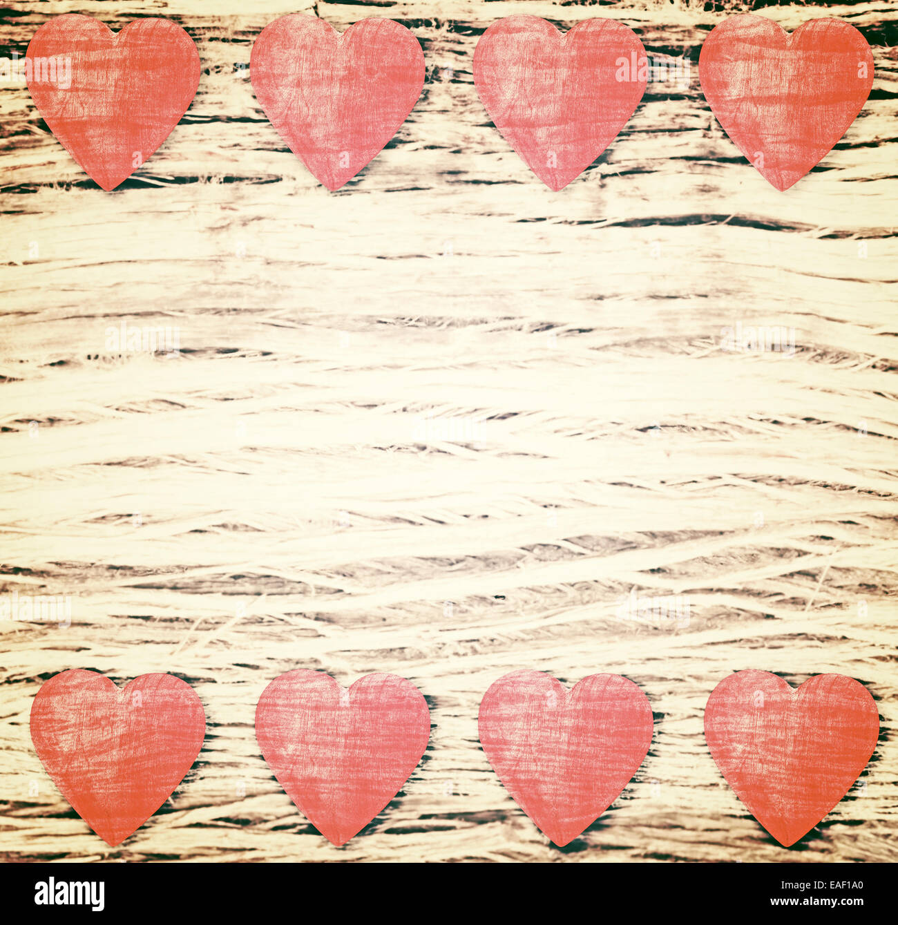 Retro filtered background with wooden hearts Stock Photo - Alamy