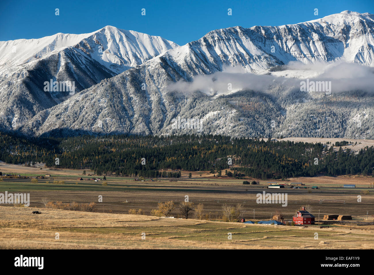 Octagonal barn on a ranch in Oregon's Wallowa Valley with fresh snow on ...