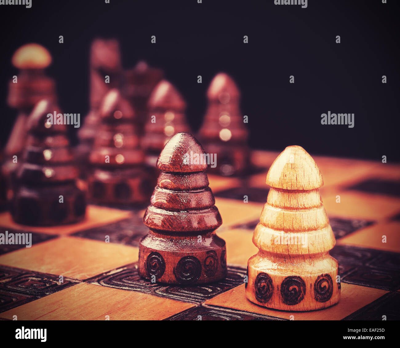Vintage filtered picture of chess, one against all concept Stock Photo ...
