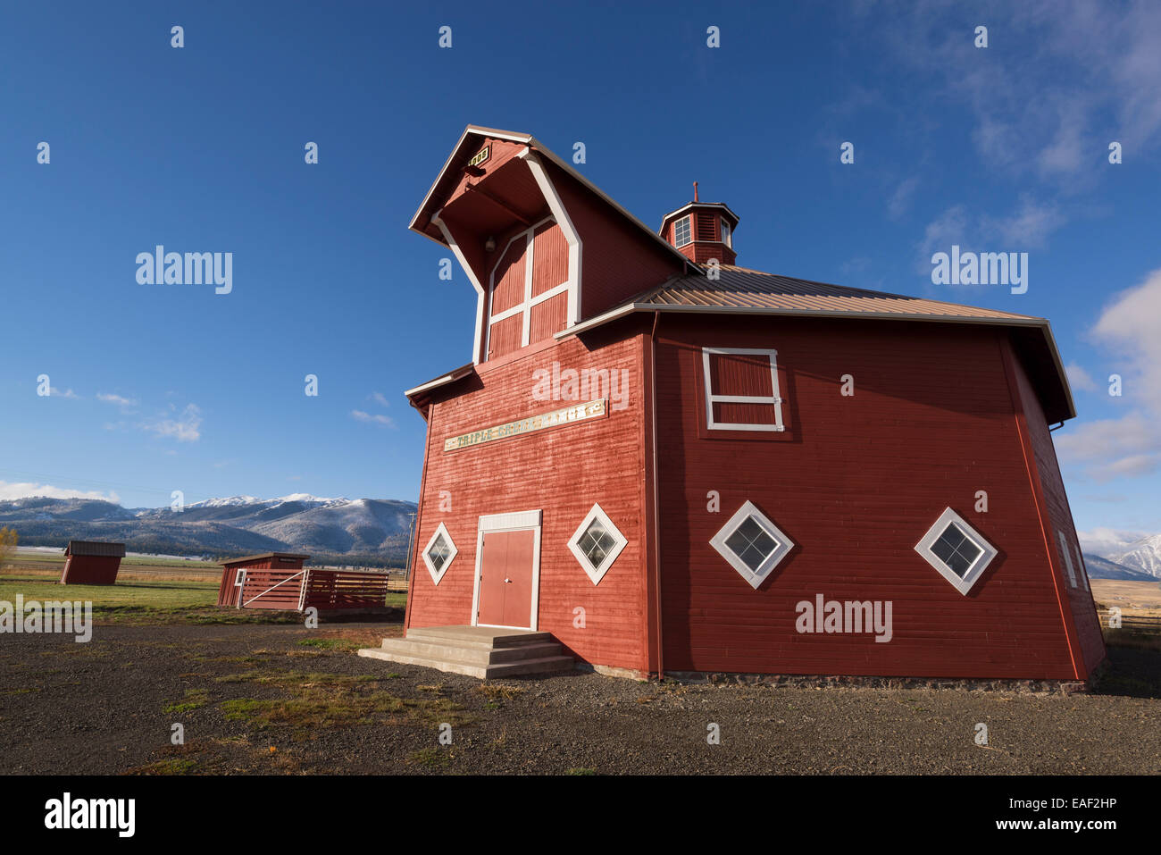 Octagonal barn on a ranch in Oregon's Wallowa Valley with fresh snow on ...