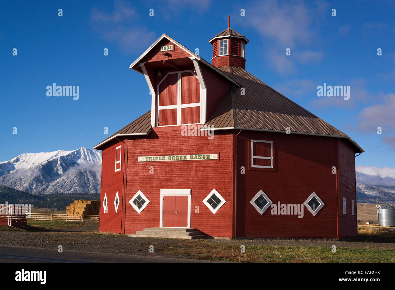 Octagonal barn on a ranch in Oregon's Wallowa Valley with fresh snow on ...