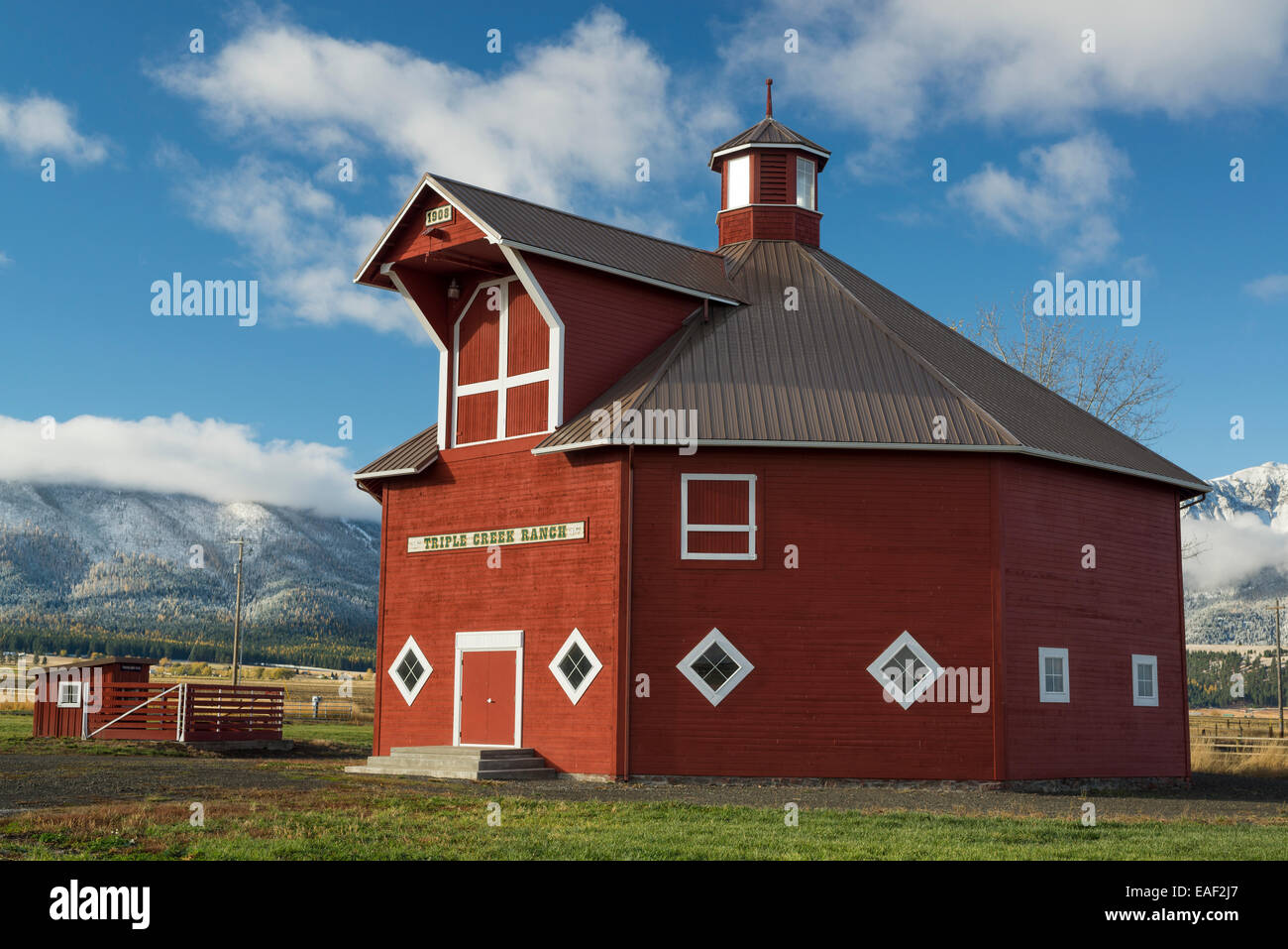 Octagonal barn on a ranch in Oregon's Wallowa Valley with fresh snow on ...