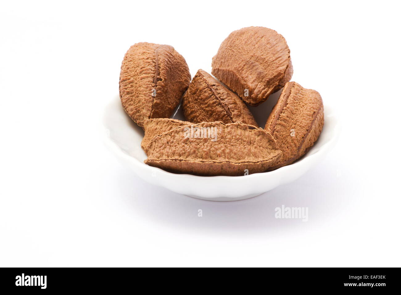 Brazil nuts (Bertholletia excelsa) on white background Stock Photo - Alamy