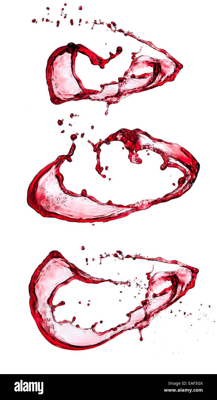 Red wine splashes isolated on white background Stock Photo - Alamy