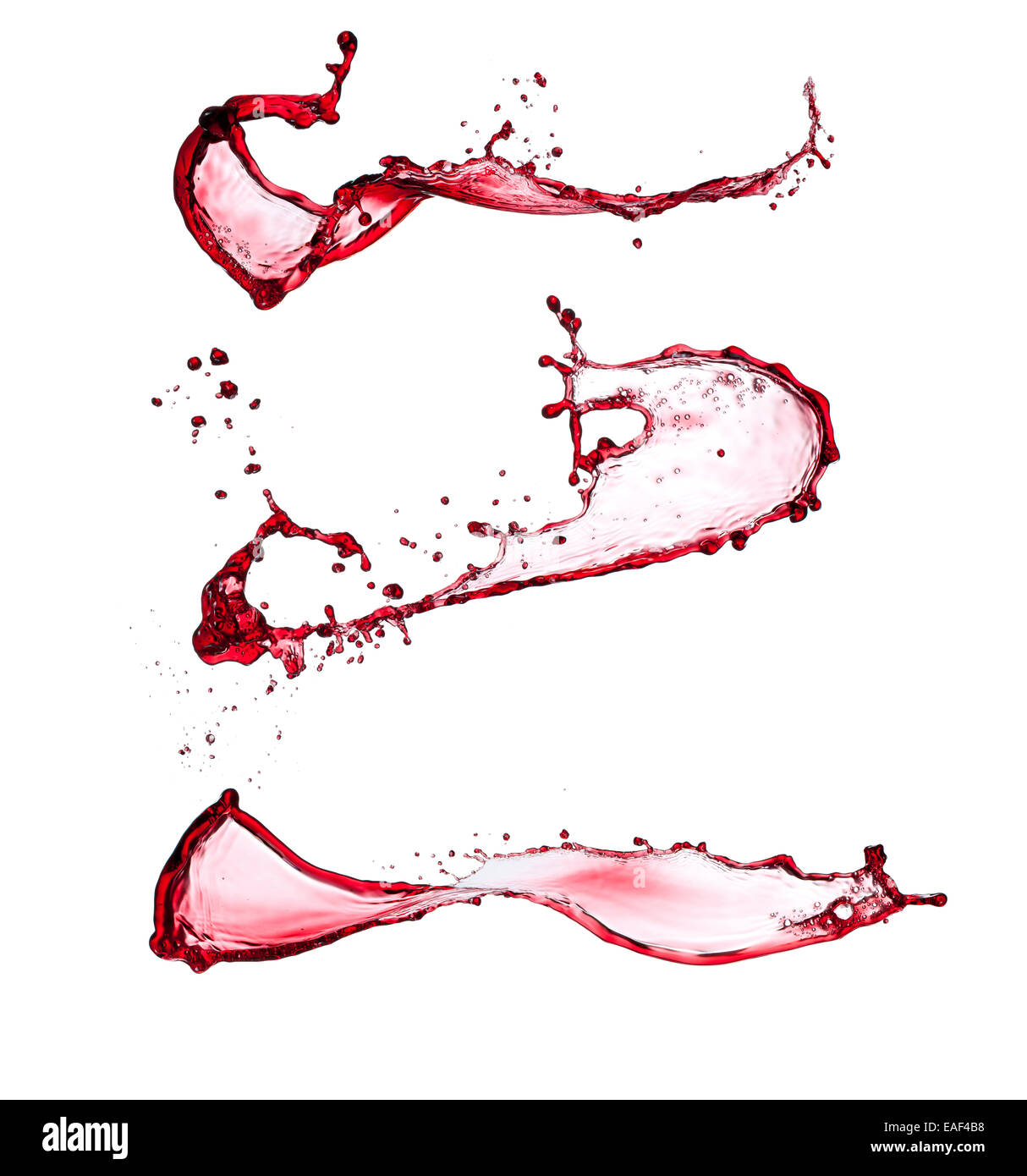 Red wine splashes isolated on white background Stock Photo - Alamy