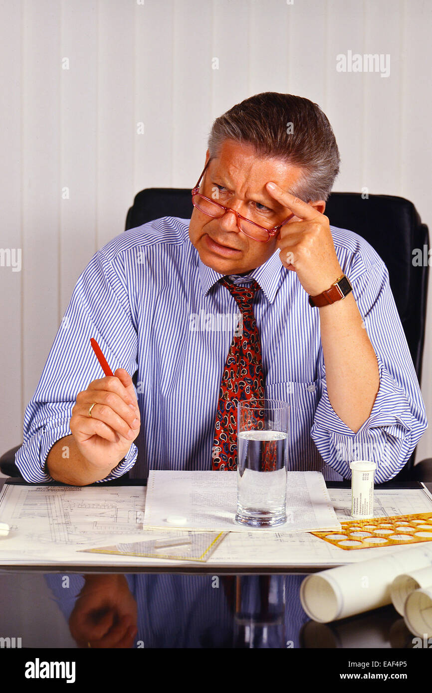 Senior Man think over construction plan for a house Stock Photo - Alamy