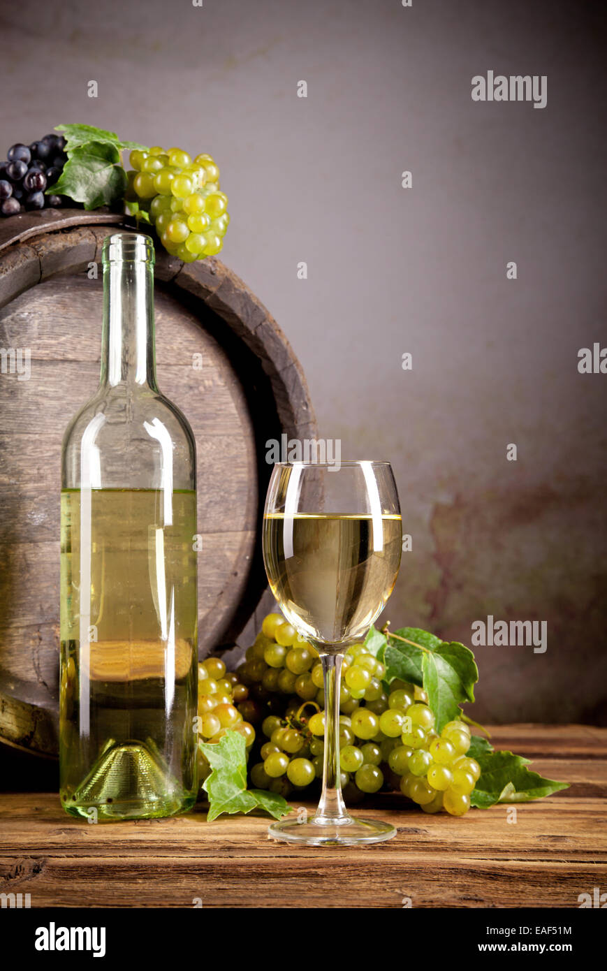 Still life of wine with wooden keg Stock Photo - Alamy