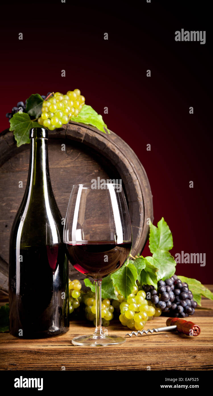 Still life of wine with wooden keg Stock Photo - Alamy